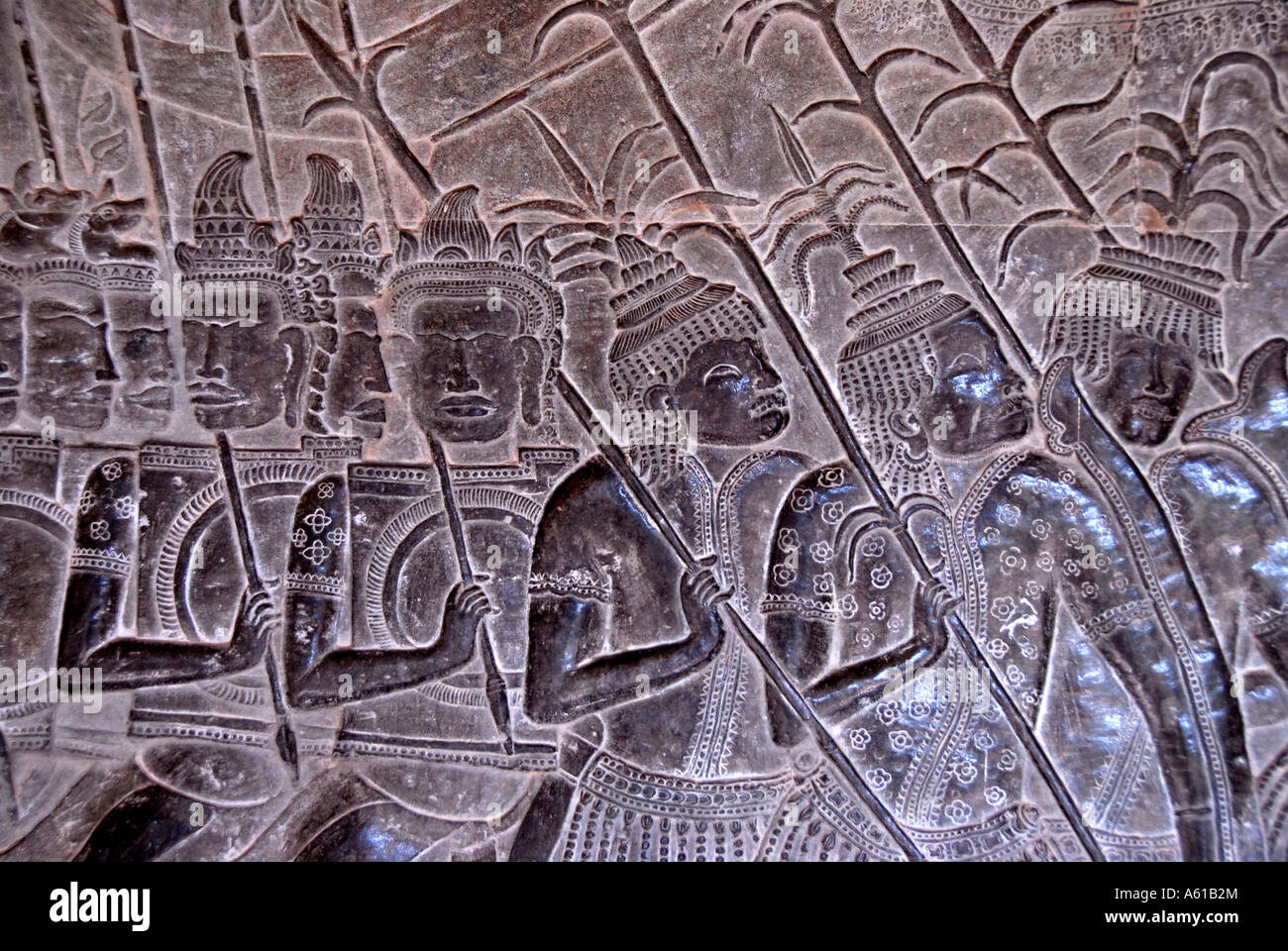 Faces of Khmer and Thai soldiers stone relief Angkor Wat Siem Reap ...