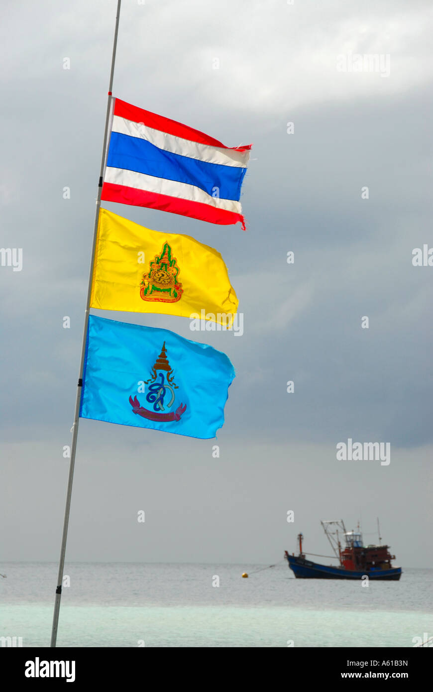 National flag and flag of the king with fishing boat Koh Lipe Thailand ...
