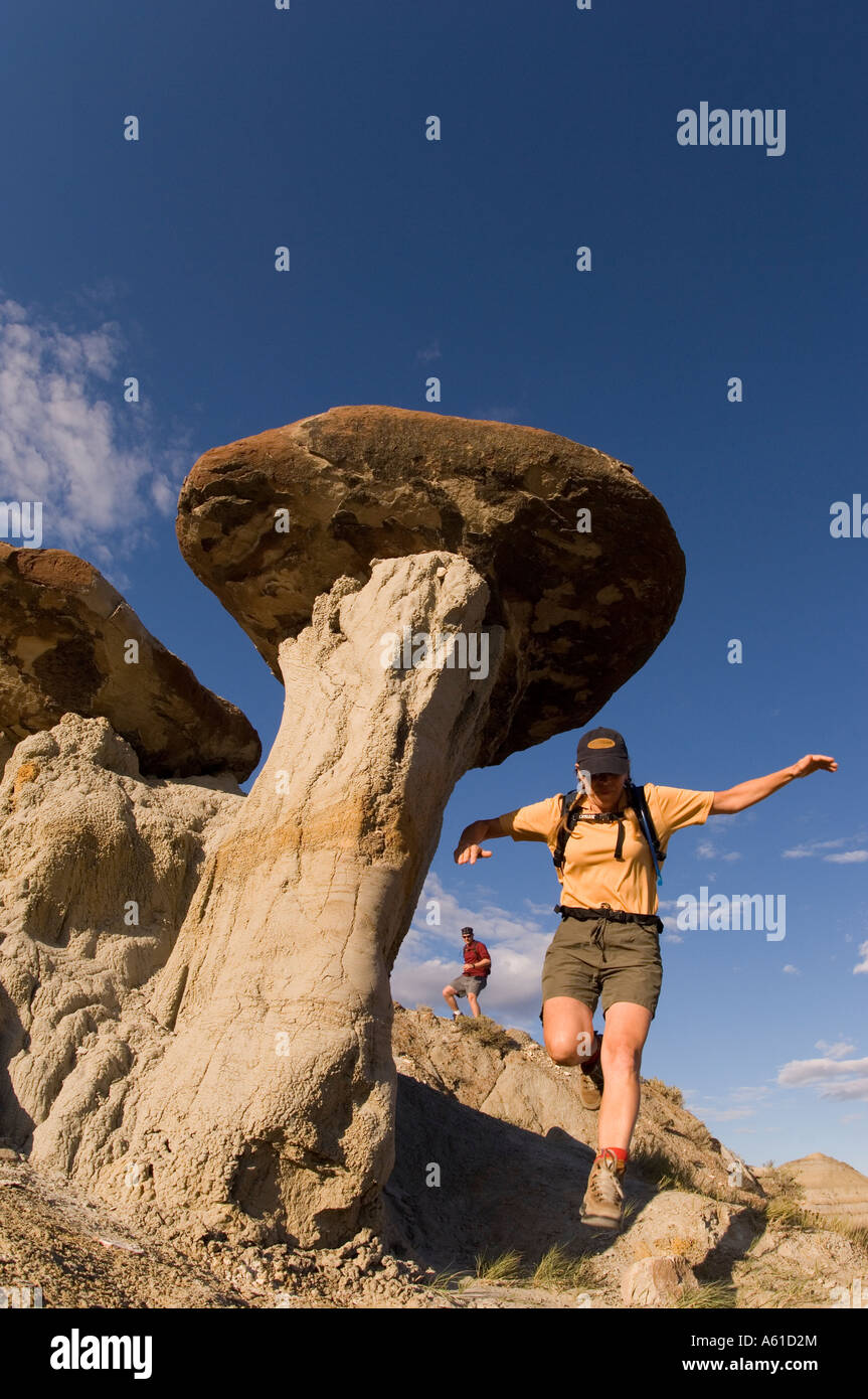 Hikers and a Mushroom Rock in Theodore Roosevelt National Park North ...