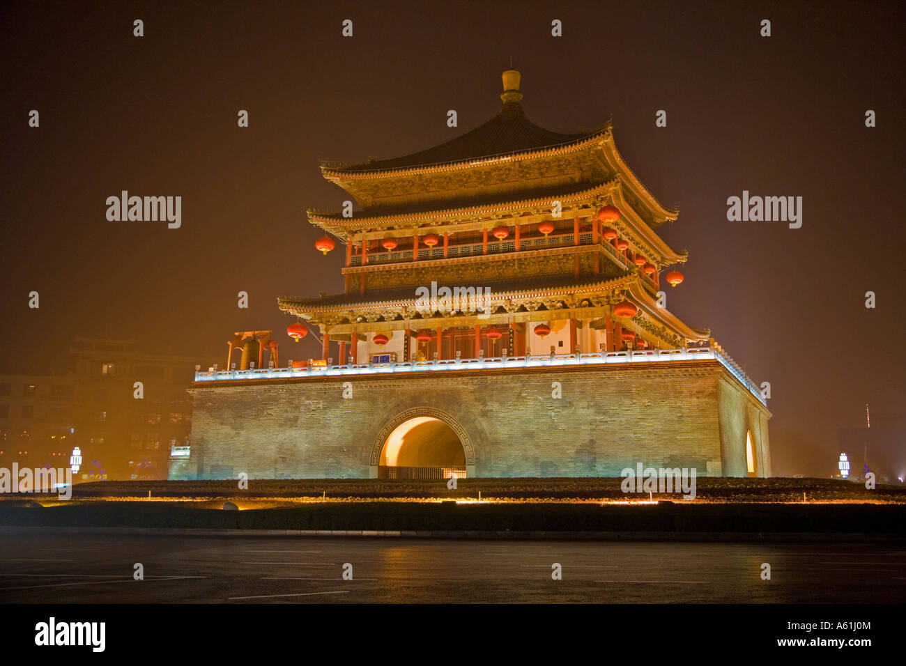 Floodlit Bell Tower at night at intersection of Bei, Dong, Nan and Xi ...