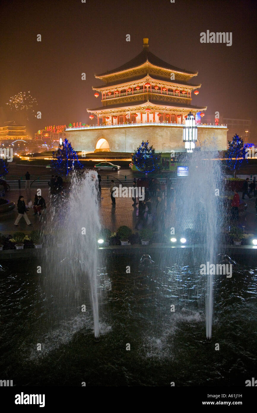 Bell Tower at night at intersection of Bei, Dong, Nan and Xi Dajie with ...