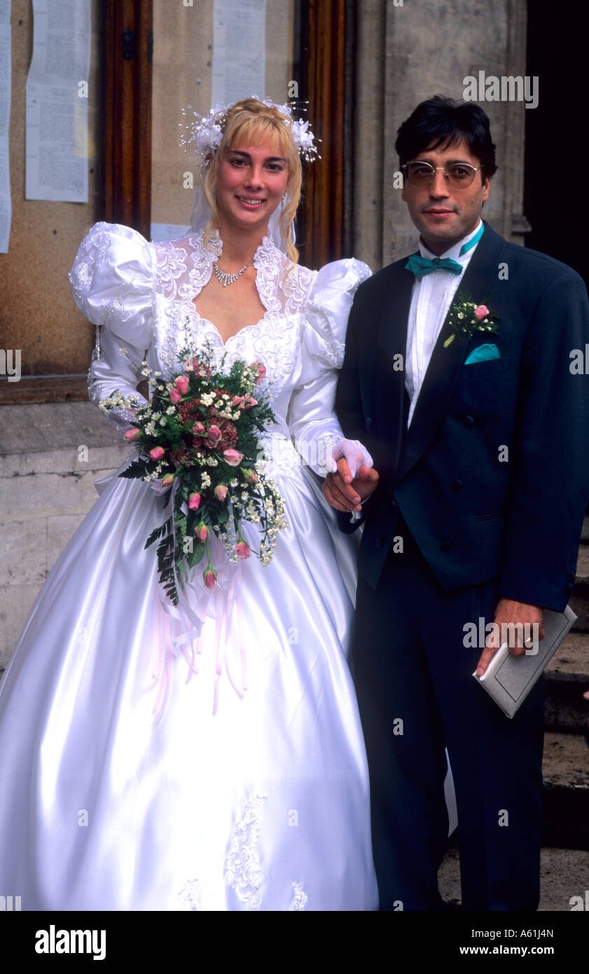 Affluent life with bride and groom in the beautiful Grand Place Square ...