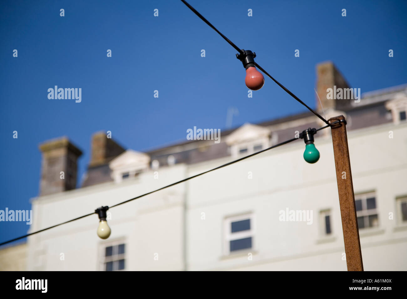 String of coloured light bulbs Stock Photo - Alamy
