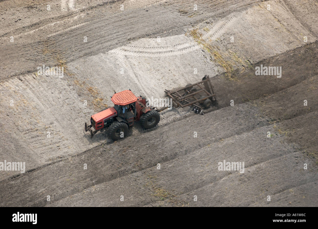 tractor and plow plowing agriculture farms farming fields dirt earth ...