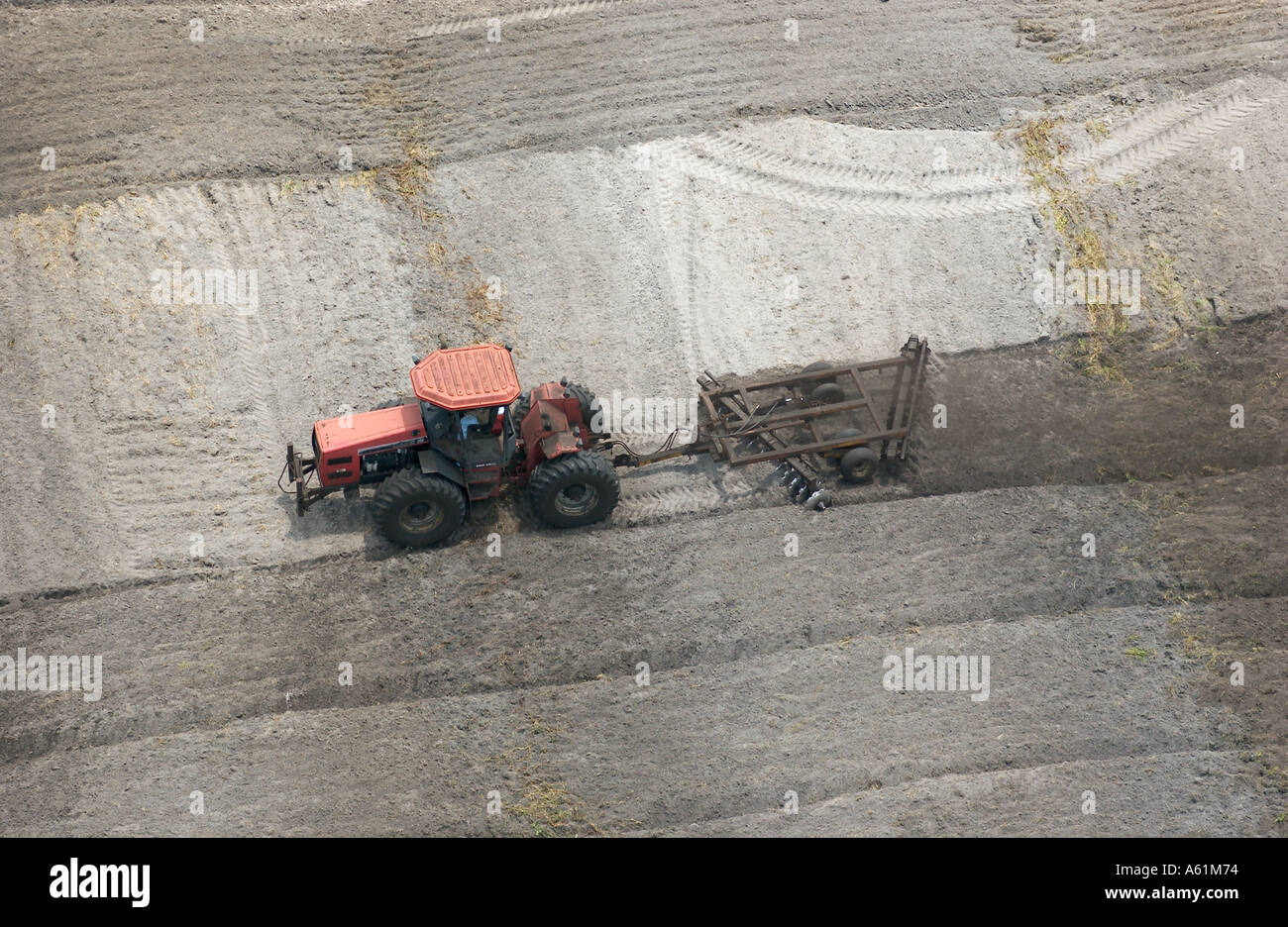 tractor and plow plowing agriculture farms farming fields dirt earth ...
