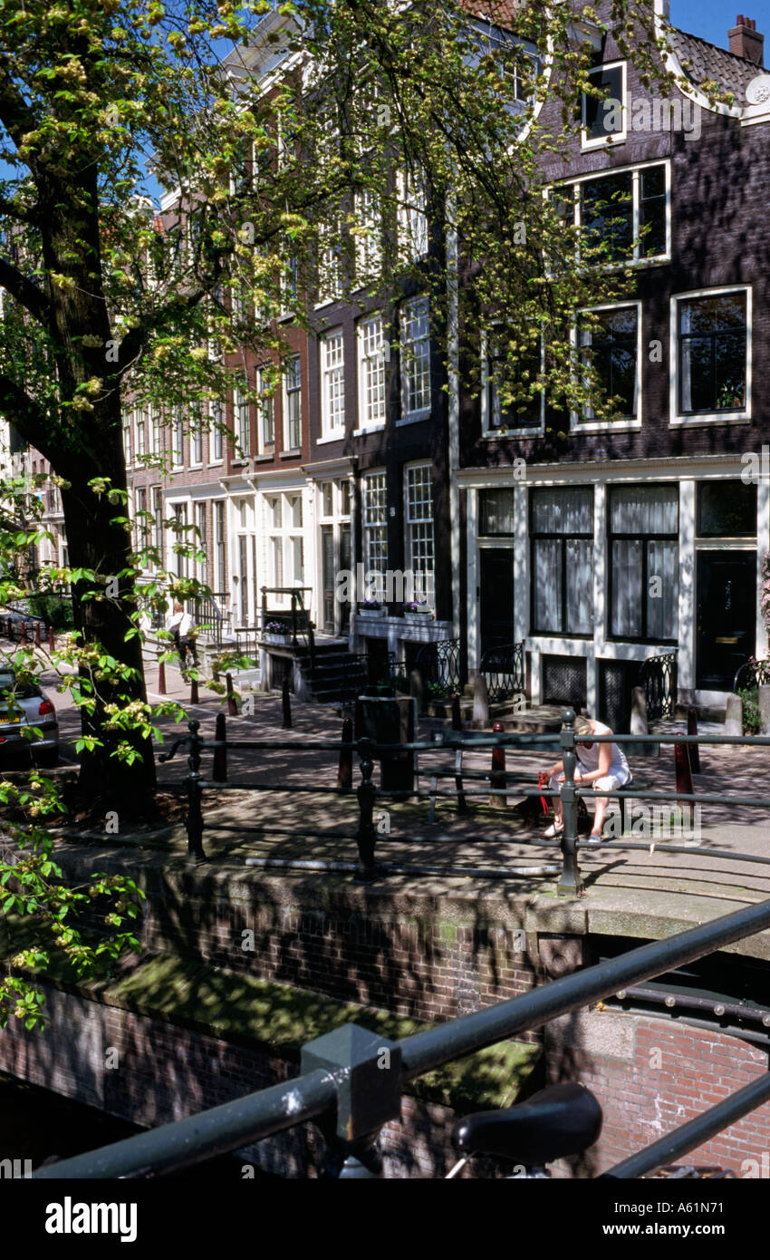 Traditional buildings at the canal side in Amsterdam Stock Photo - Alamy