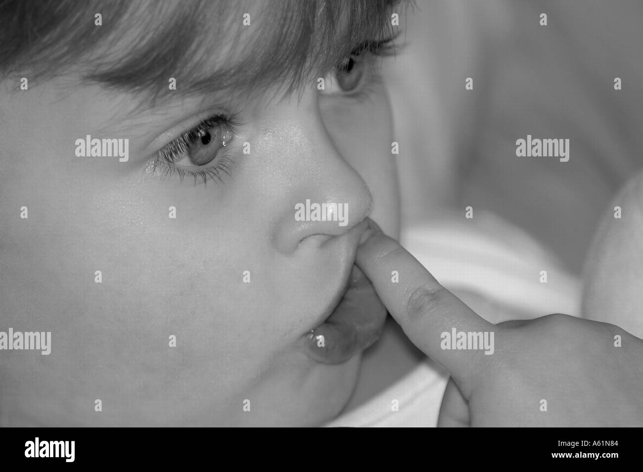 Toddler with baffled expression portrait Stock Photo - Alamy