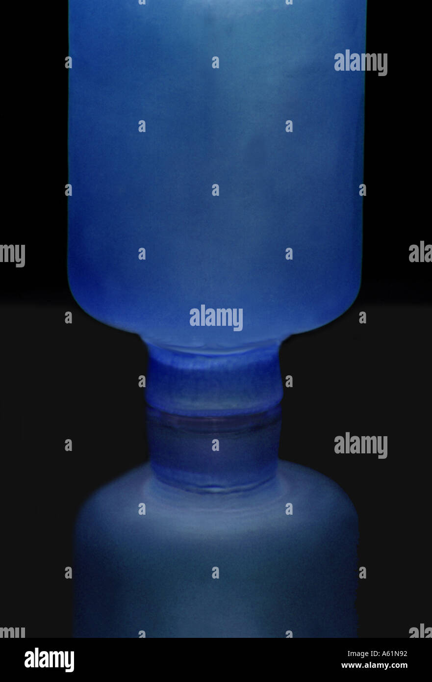 Still life Blue glass bottle close up Stock Photo - Alamy