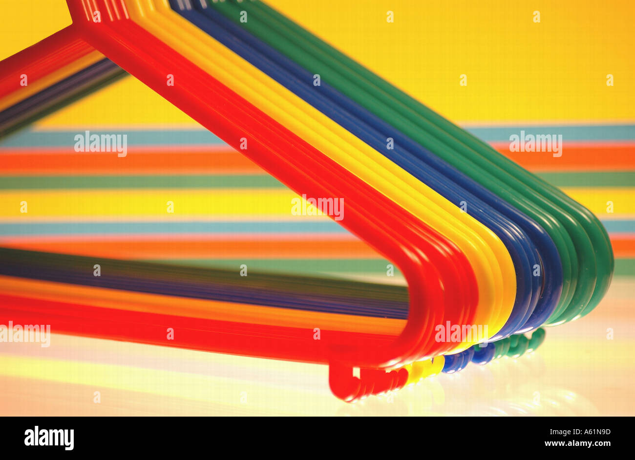 Multi colored plastic clothes hangers hi-res stock photography and ...