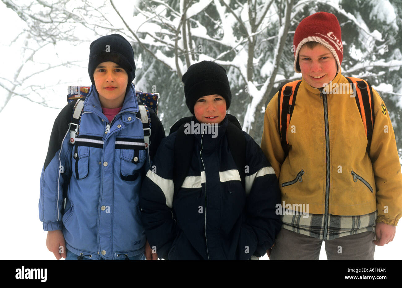 Life in Switzerland children ages 10 12 in snow dressed for winter in ...