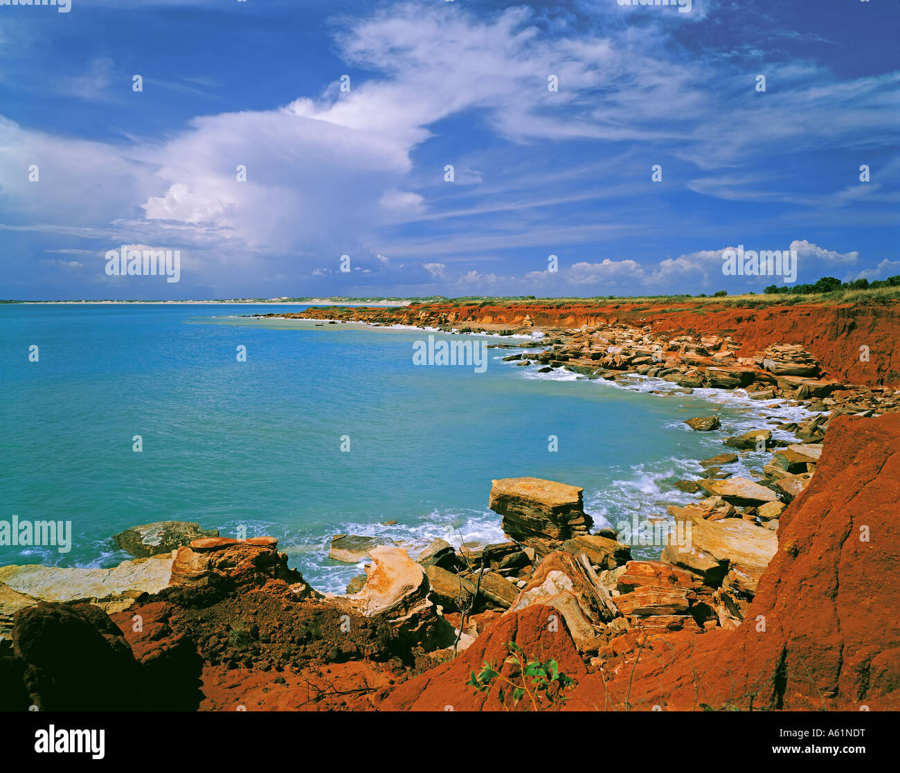 Red pindan soil rocks and turquoise sea at Gantheaume Point Broome ...