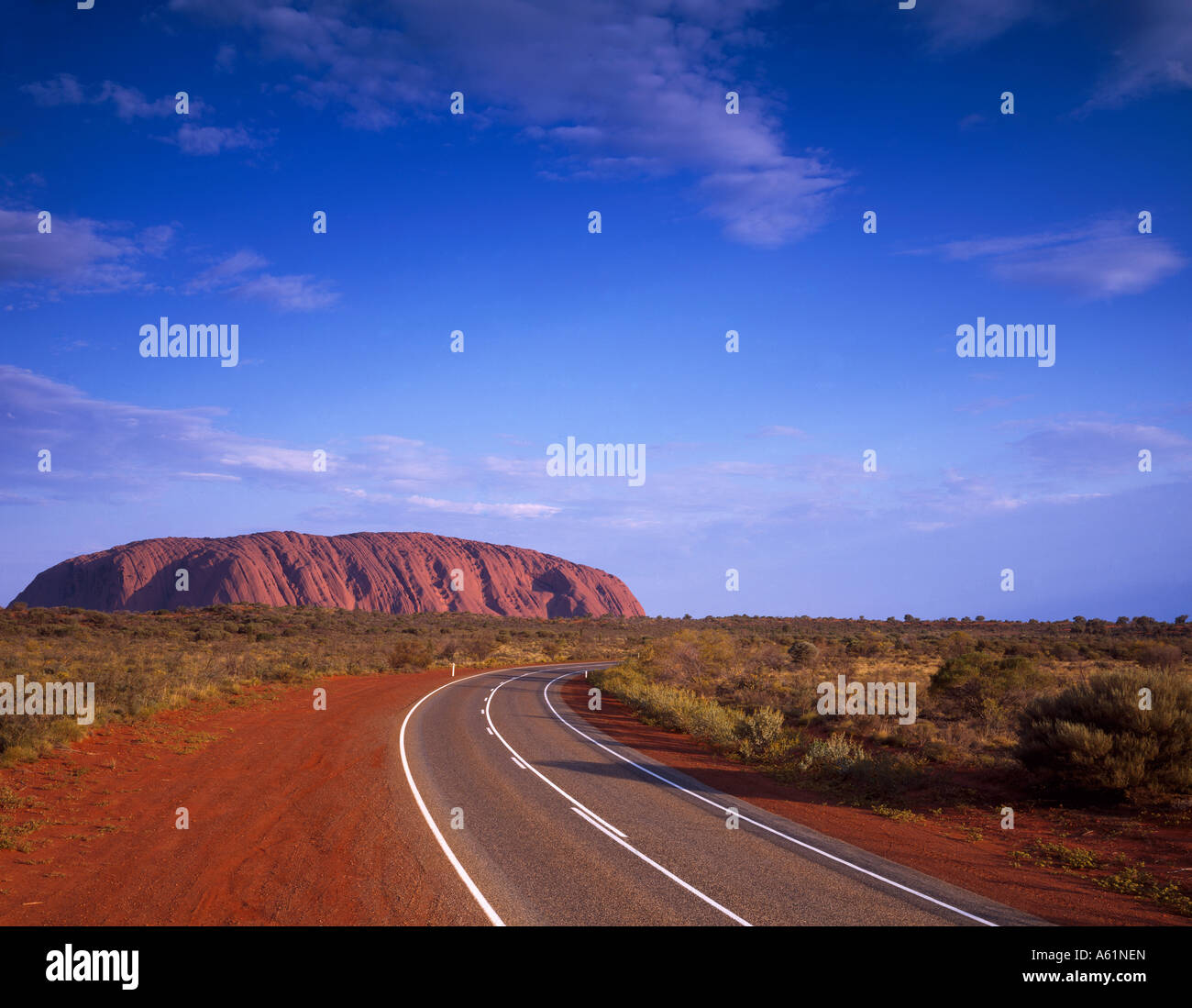 Road to Uluru in late afternoon Uluru Kata Tjuta National park Northern ...