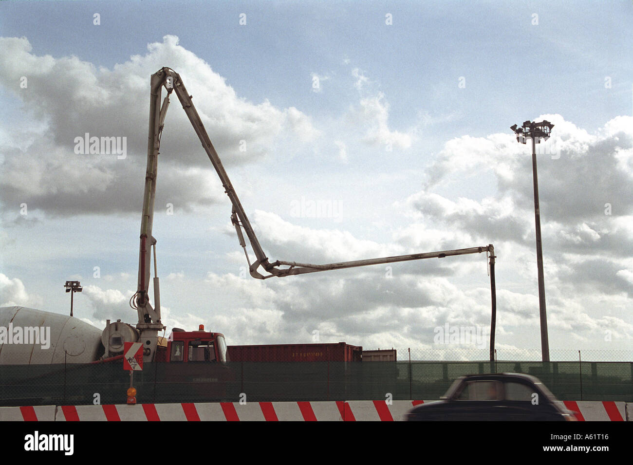 concrete pump in action on building site Stock Photo - Alamy