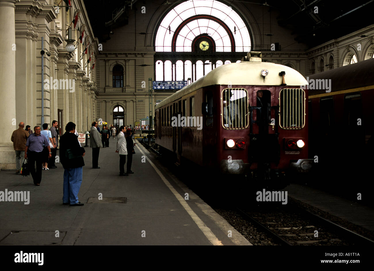A vintage Hungarian Railways passenger train leaving Keleti station ...