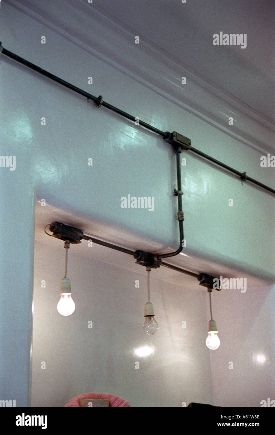 three light bulb connection two lit Stock Photo - Alamy