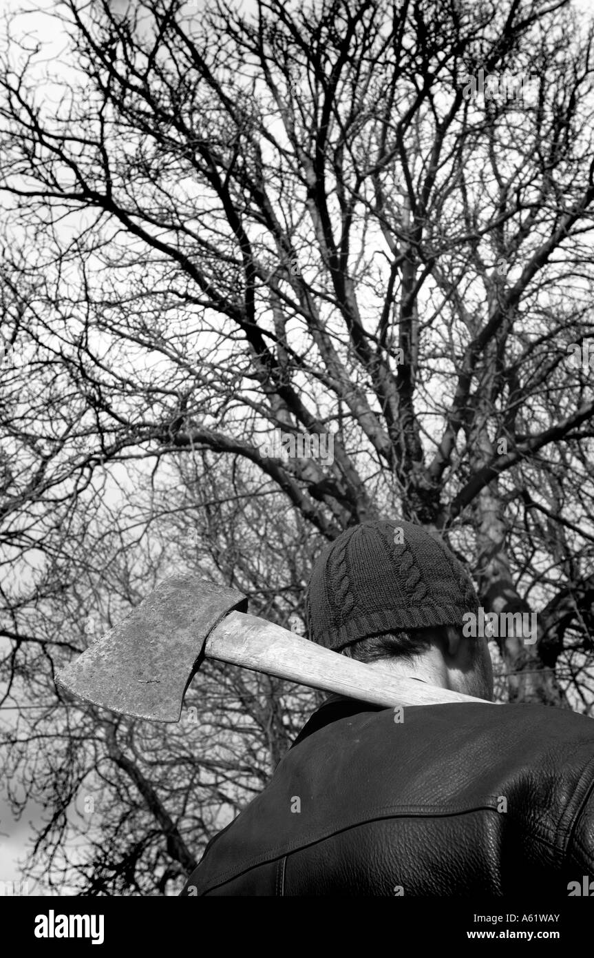 Axe man and tree Stock Photo - Alamy