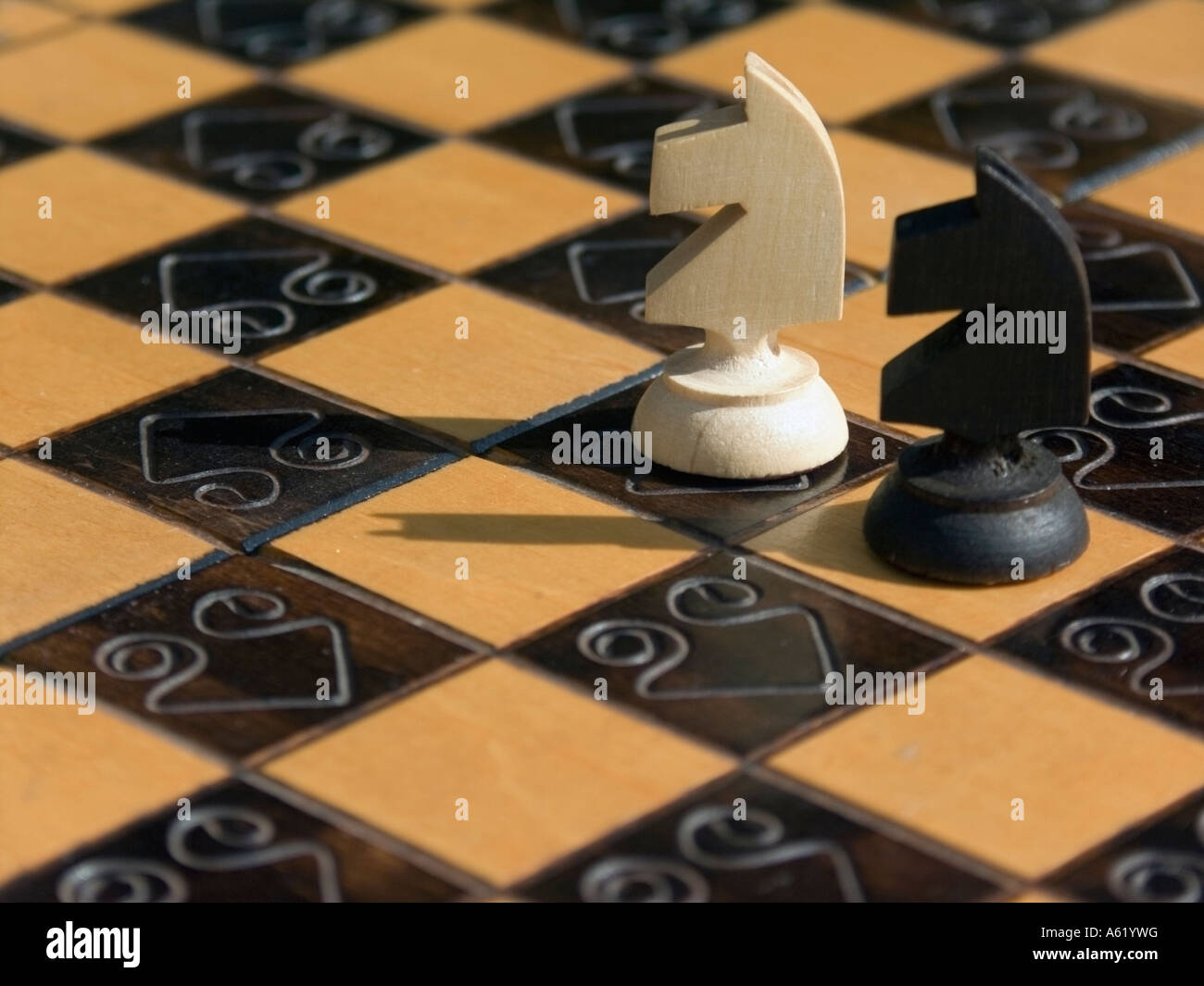 Chessman two balck and white Knights Stock Photo - Alamy