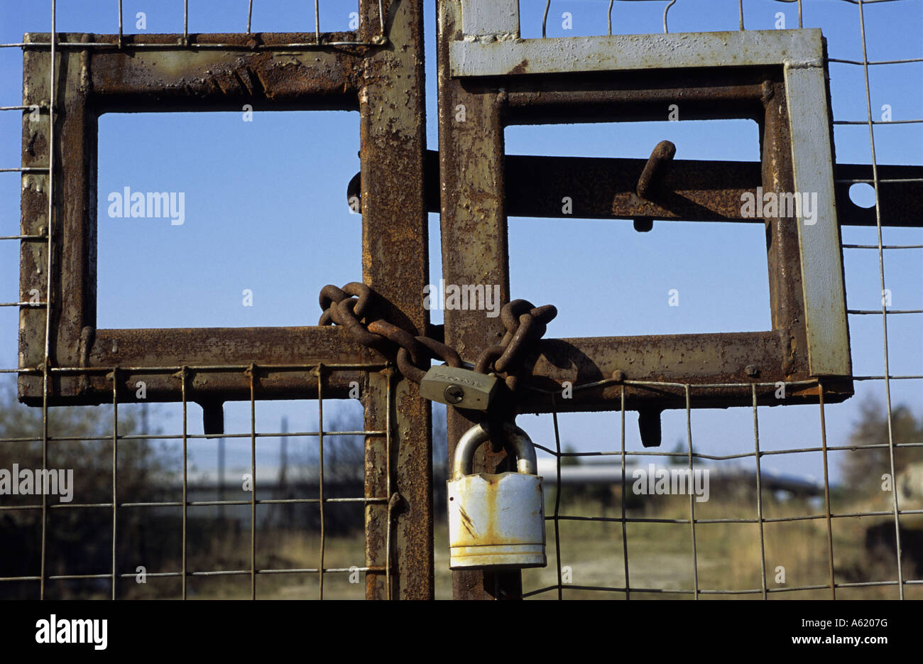 Padlocked gates hi-res stock photography and images - Alamy