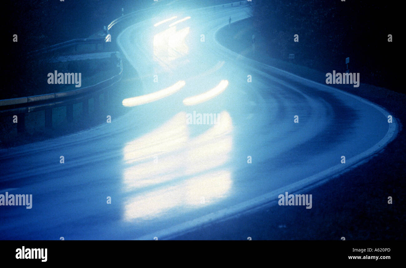 Cars moving on road during rain Stock Photo - Alamy