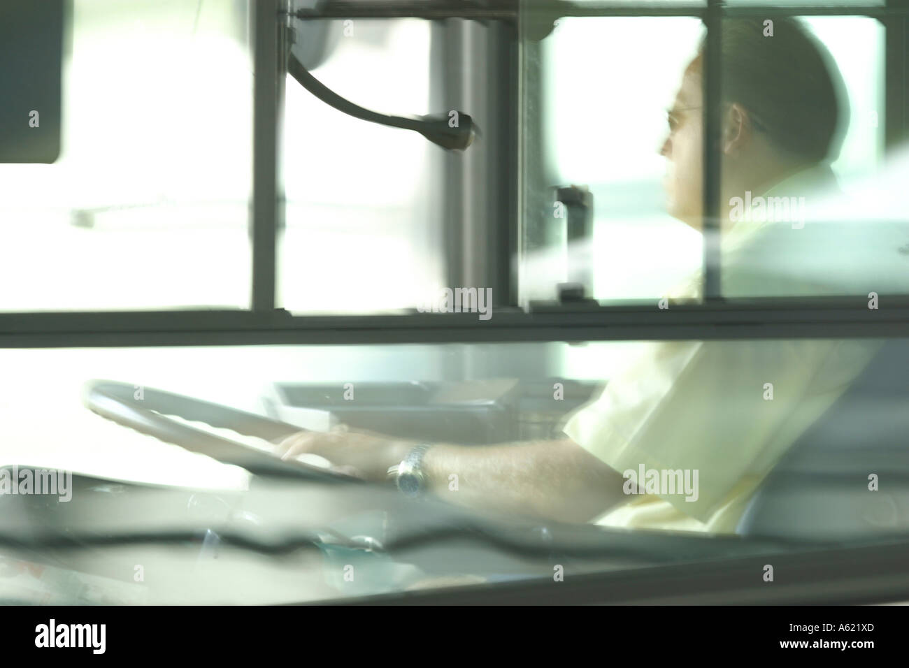 Man driving bus Stock Photo - Alamy