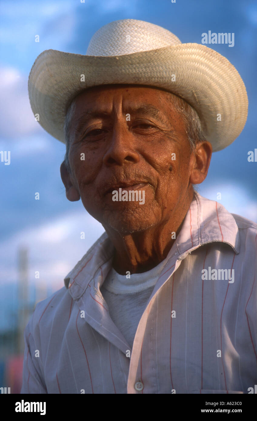 MEXICO Yucatan Hoctun Smiling elderly men in hat head and shoulders ...