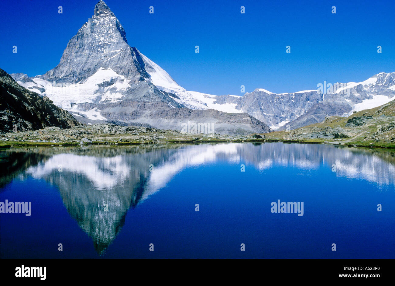 Reflection of mountain in lake, Mt Matterhorn, Riffelsee Lake, Zermatt ...