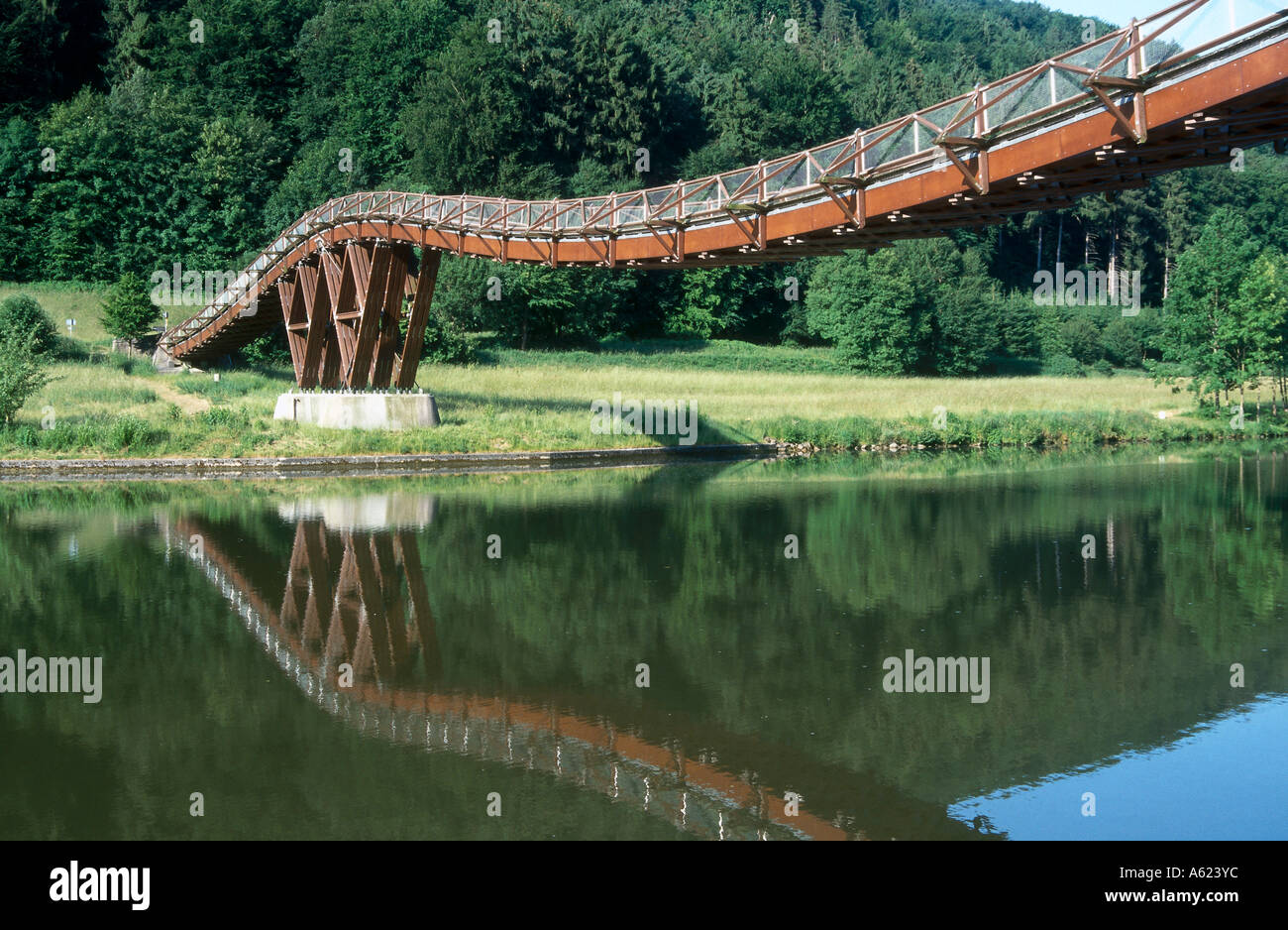 Wooden bridge across river, Altmuhl River, Bavaria, Germany Stock Photo ...