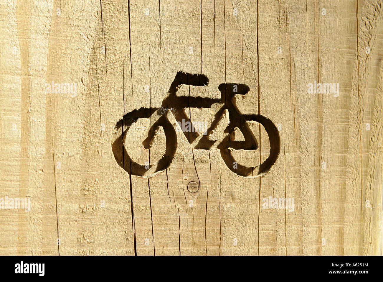 Cycle path sign on a wooden post Stock Photo - Alamy