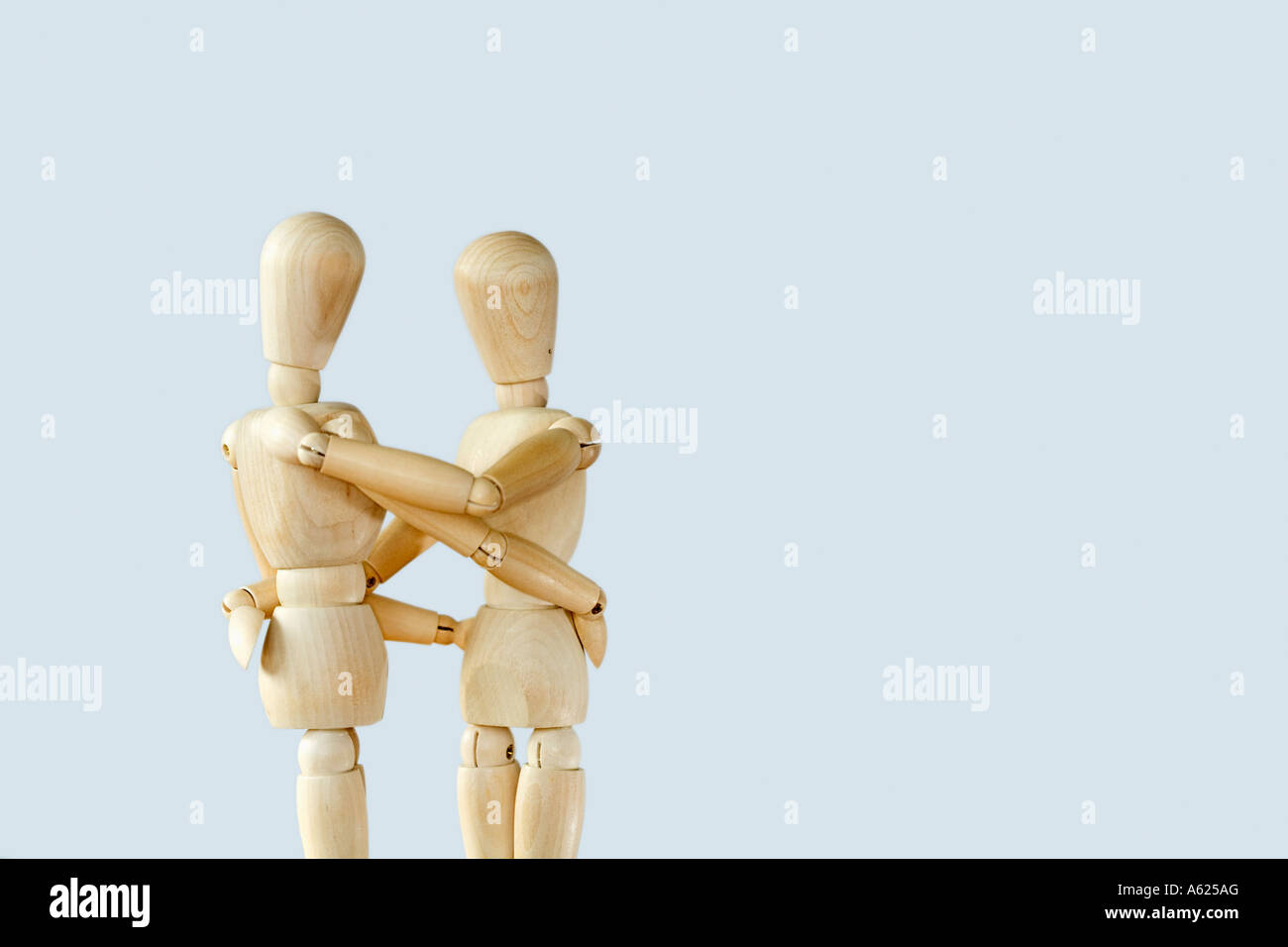 Concept two figures embrace hug cuddle Stock Photo - Alamy