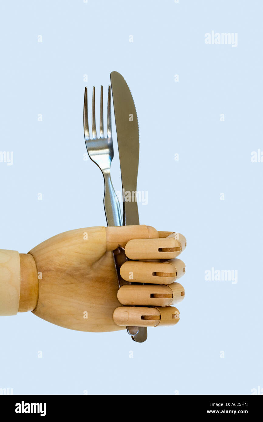 Holding silverware hi-res stock photography and images - Alamy