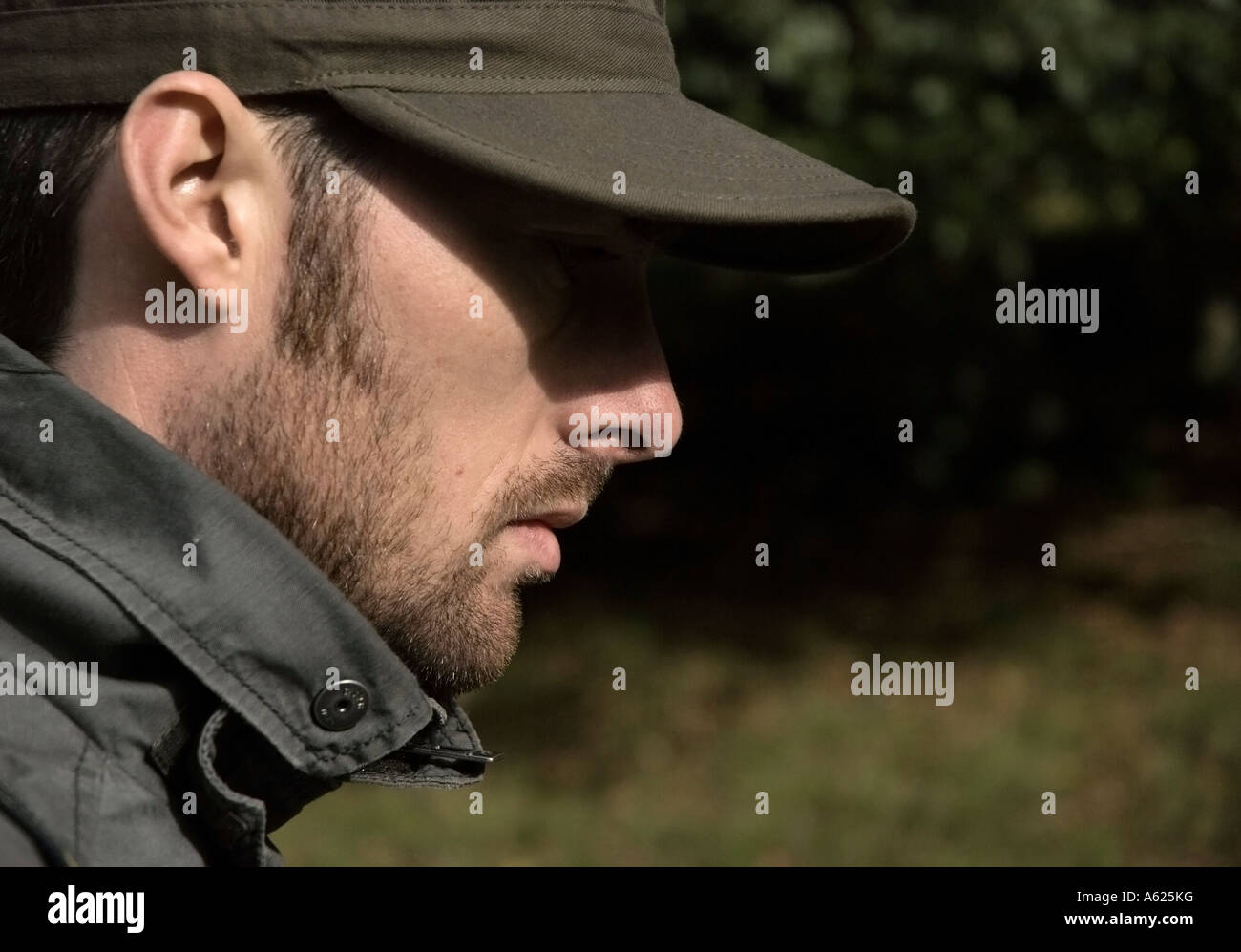 Young man in profile, shadow hiding eyes Stock Photo - Alamy