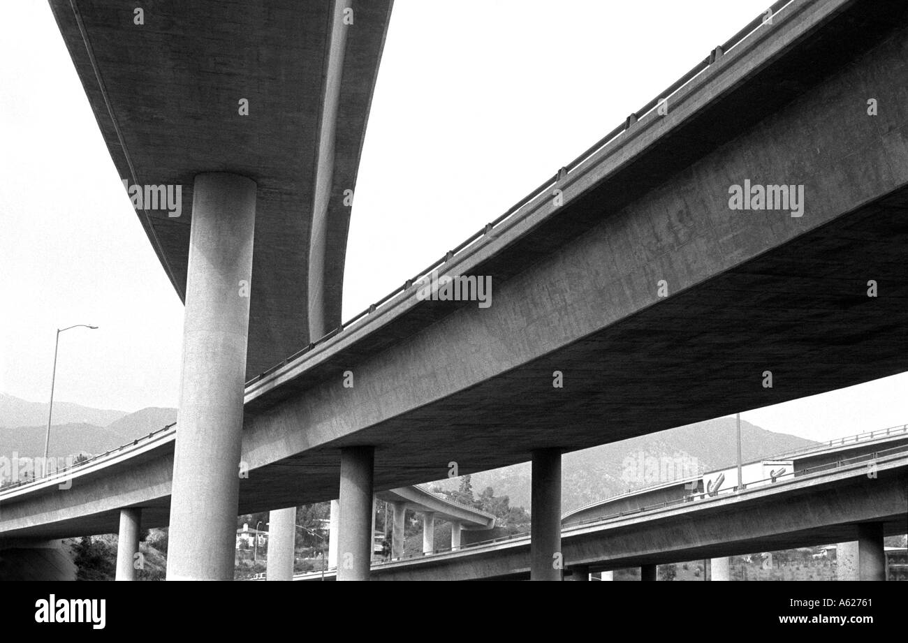 School bus travels on highway overpass Stock Photo - Alamy