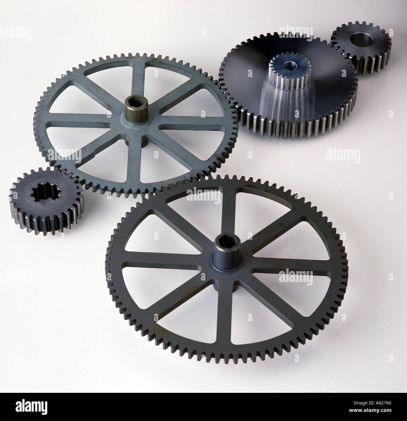 Group of gears connected together Stock Photo - Alamy