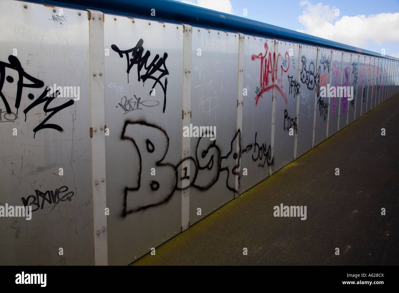 Graffiti on a railway footbridge at Ebbsfleet, Swanscombe Kent UK Stock ...