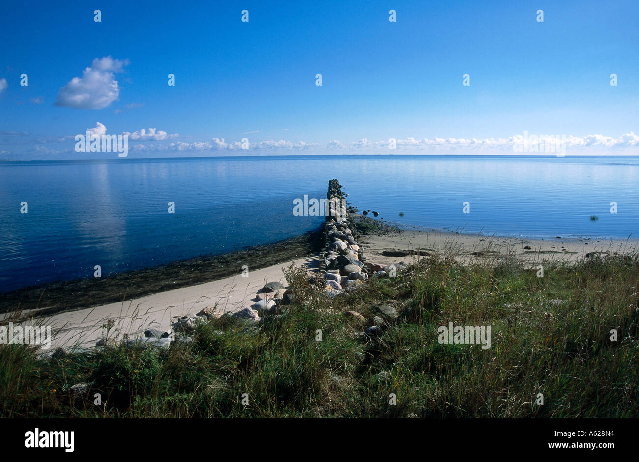 Stone pier in the sea water Stock Photo - Alamy