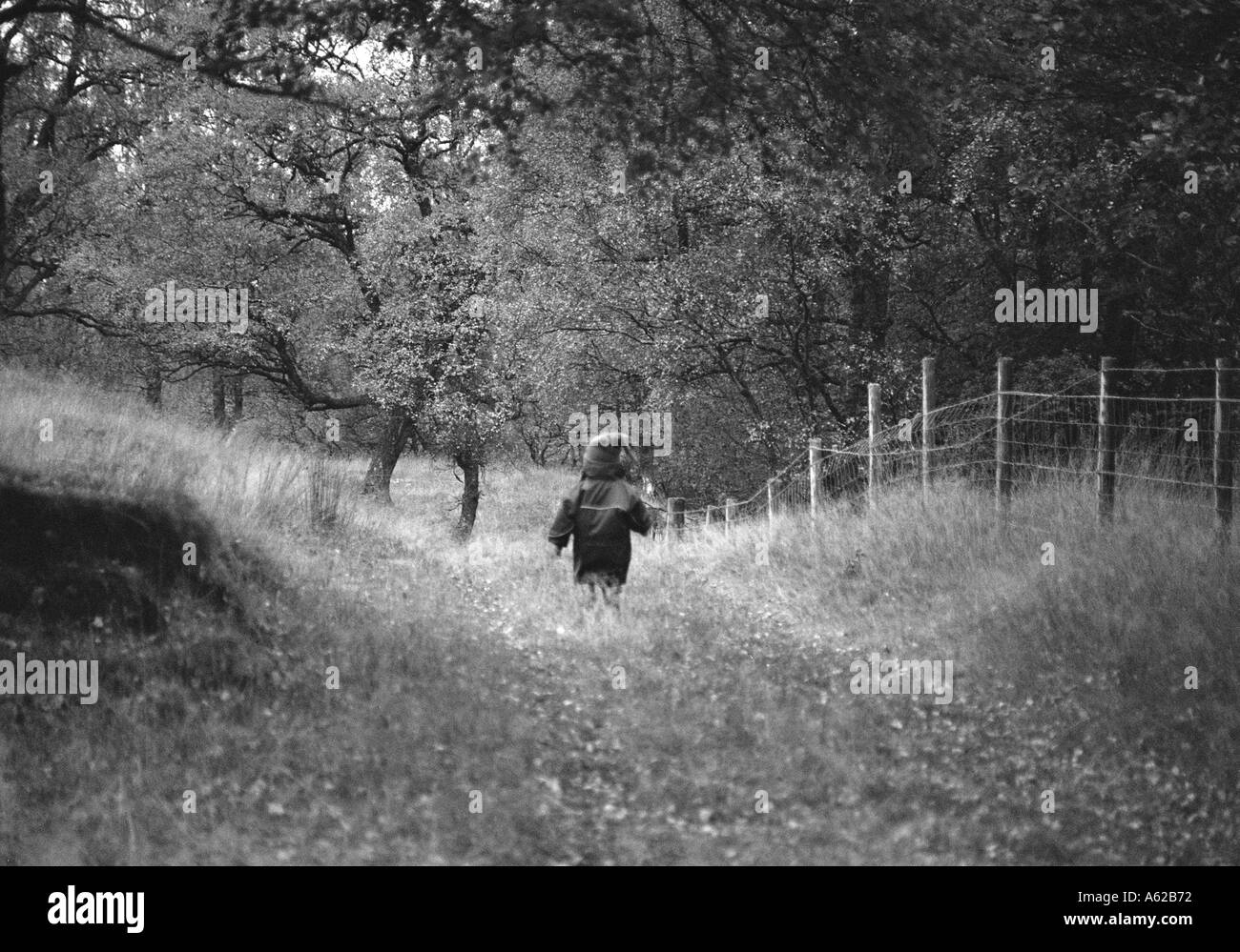Back small child in Black and White Stock Photos & Images - Alamy