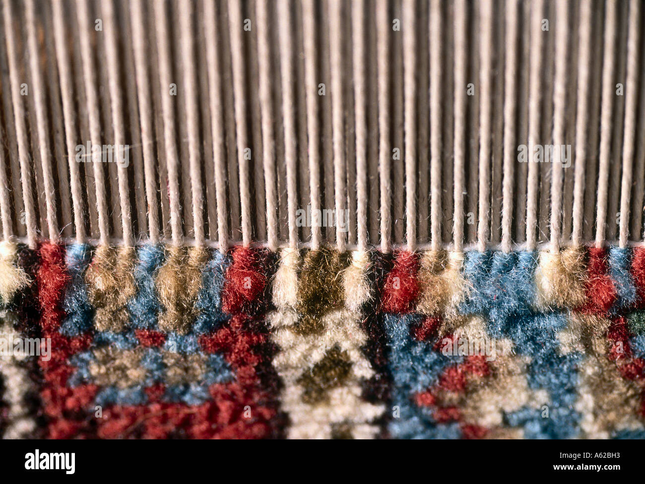Wood loom for weaving carpet Stock Photo - Alamy