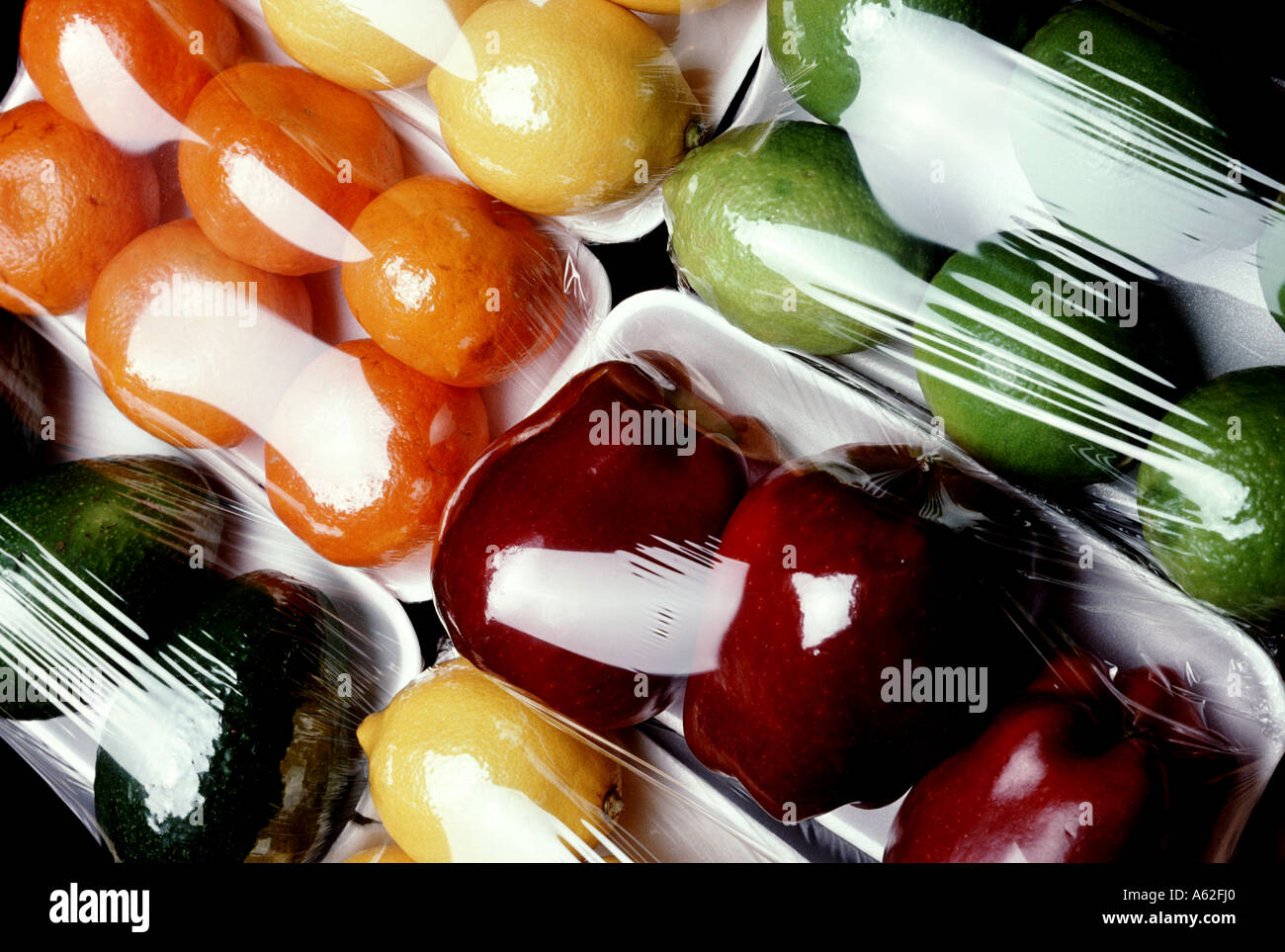 a close up of shrinkwrapped fruits and vegetables Stock Photo - Alamy