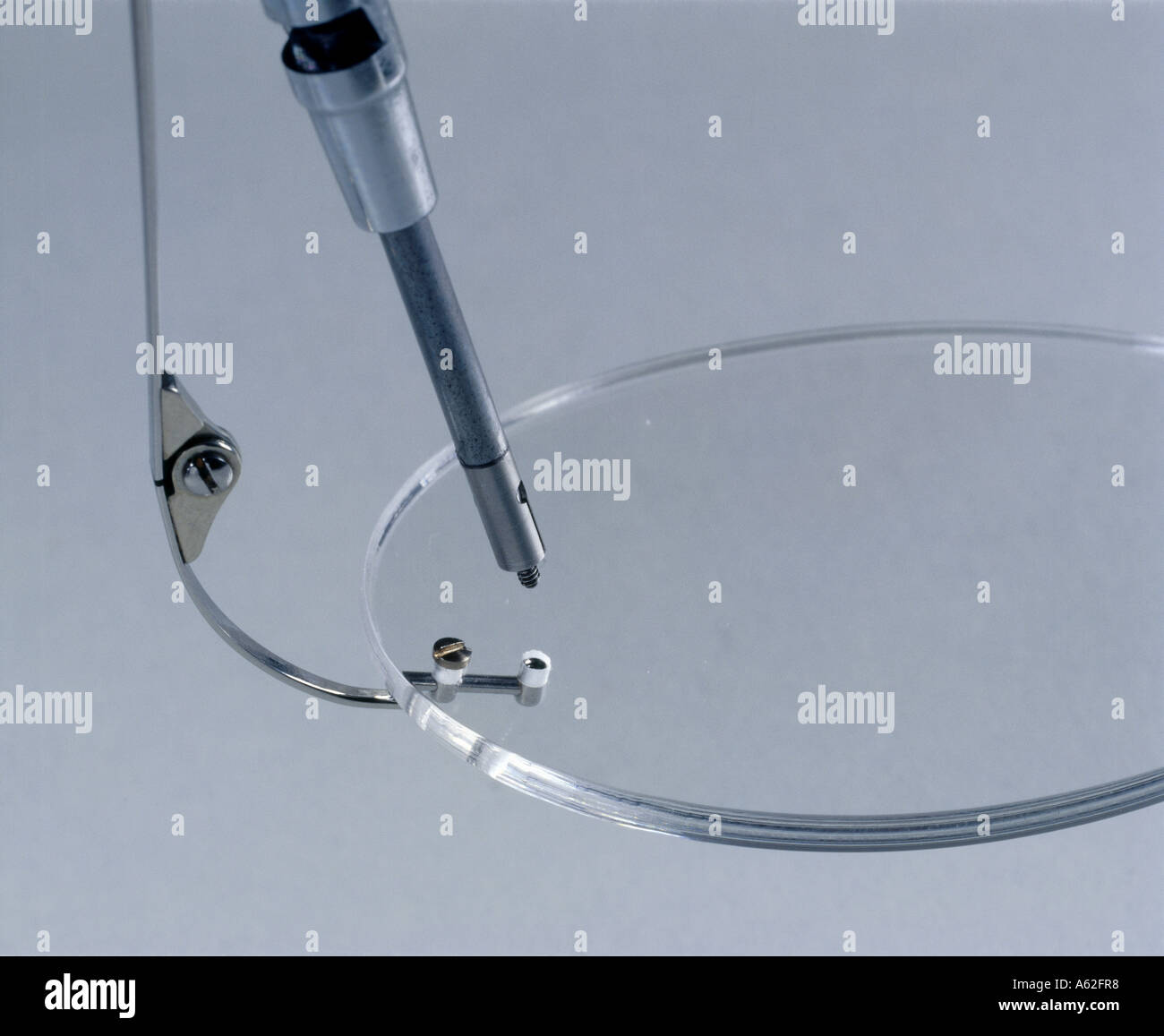 Fixing eyeglasses hi-res stock photography and images - Alamy