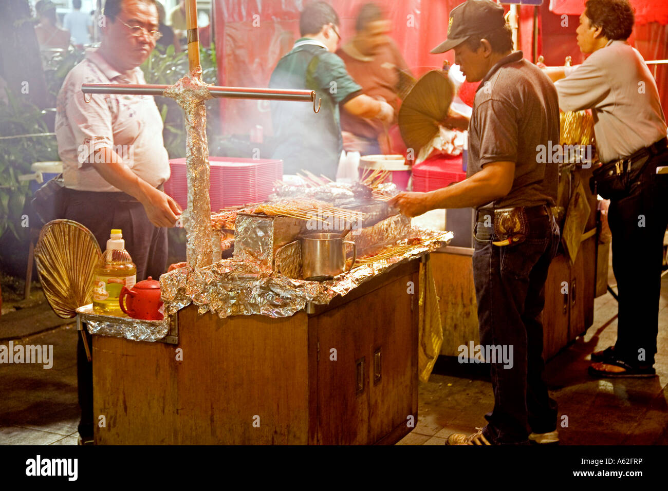 Cooking satay at Lau Pa Sat hawker centre, Chinatown, Singapore Stock ...