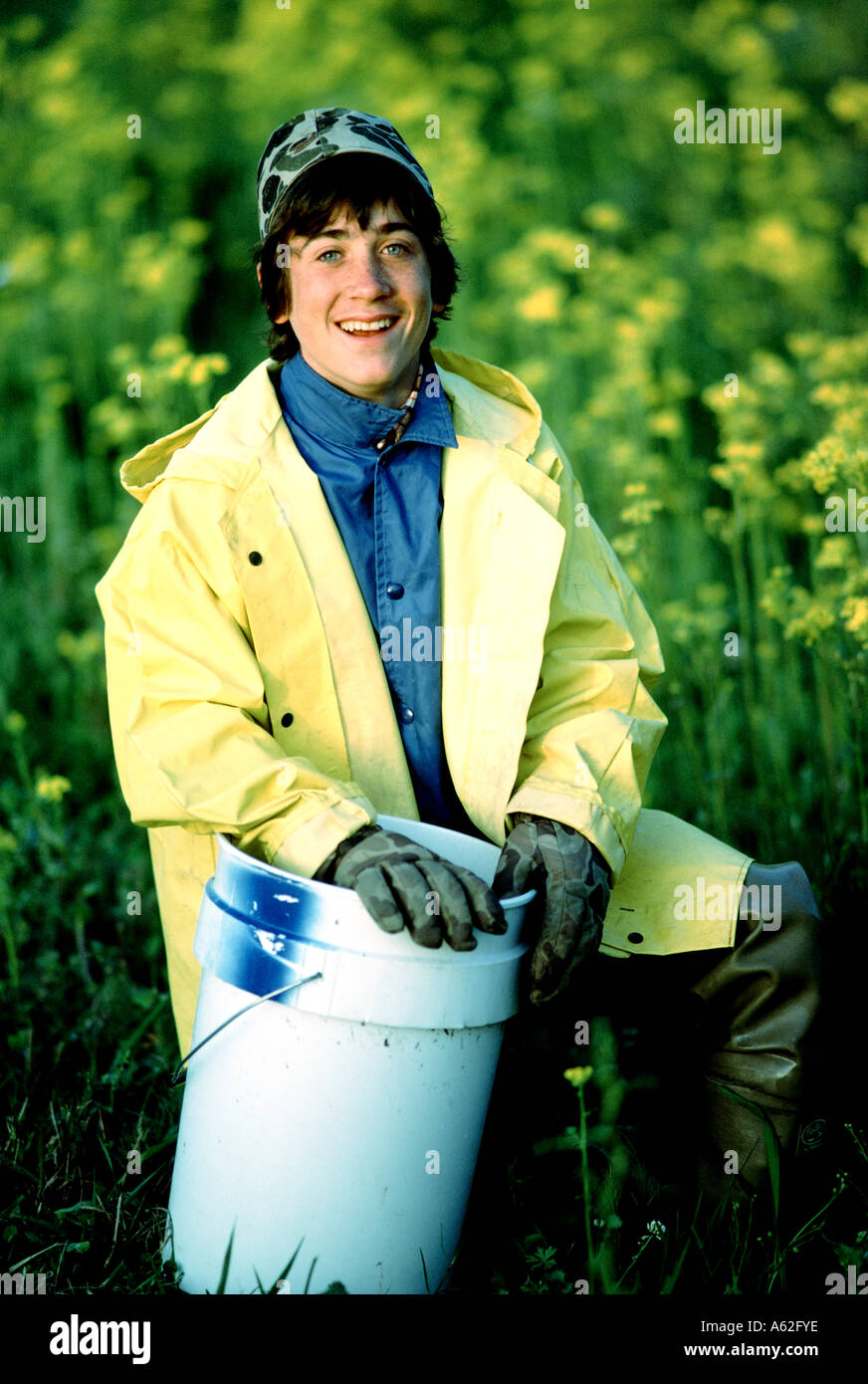 A young boy poses for the camera while gathering crawfish in Louisiana ...