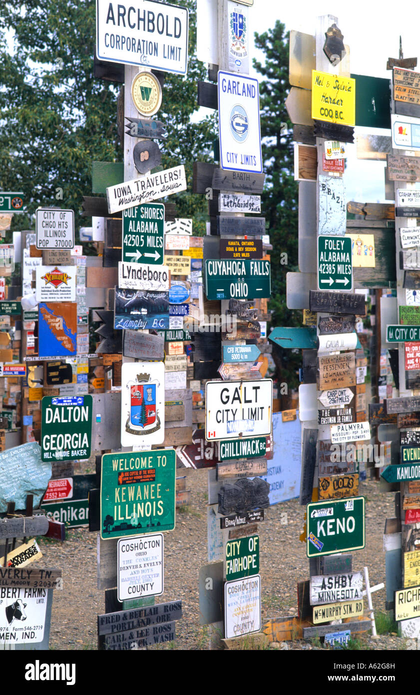 Famous 25,000 town sign post forest in Watson lake Yukon Canada Stock ...