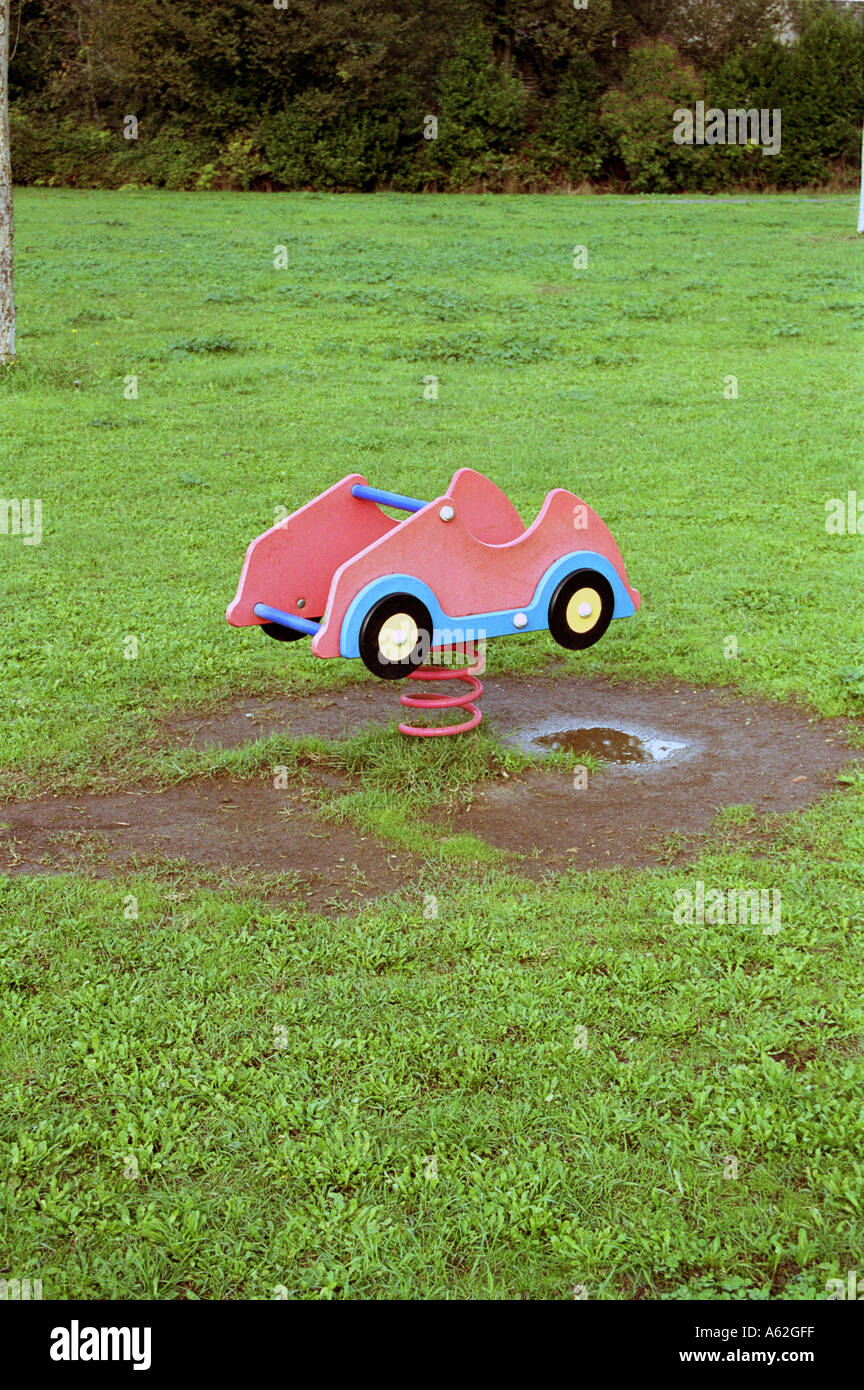 red playground toy car ride Stock Photo - Alamy