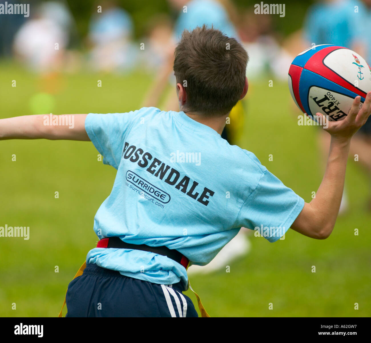Boy playing rugby hi-res stock photography and images - Alamy