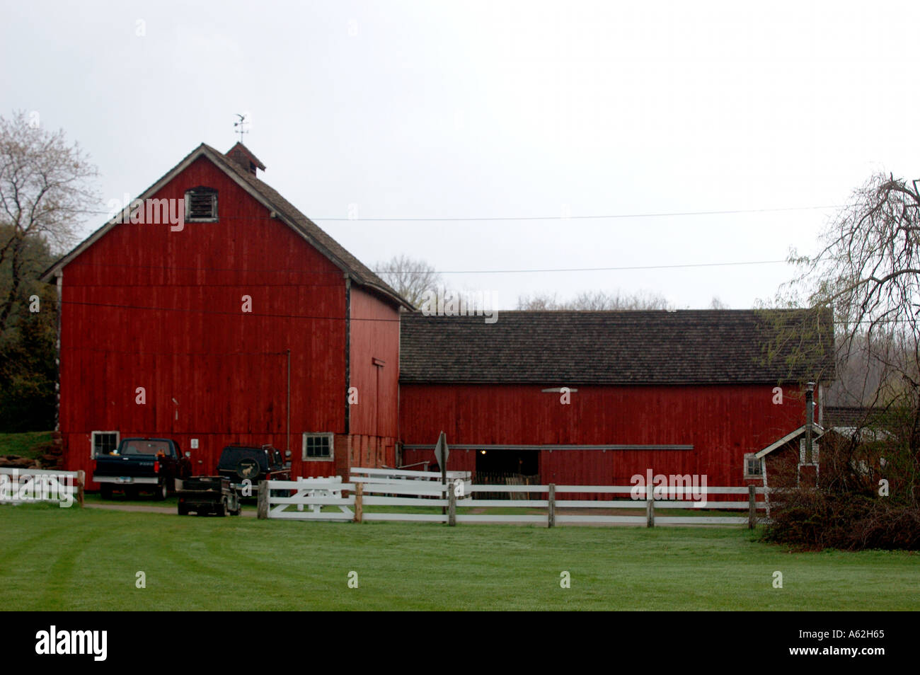 side of barn barn side red white window beat up barn weathered aged red ...
