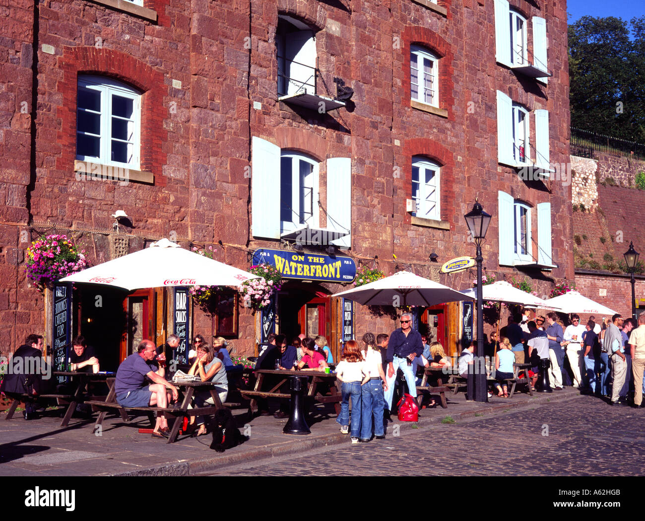Large group of people at sidewalk cafe, Devon, France, Europe Stock ...