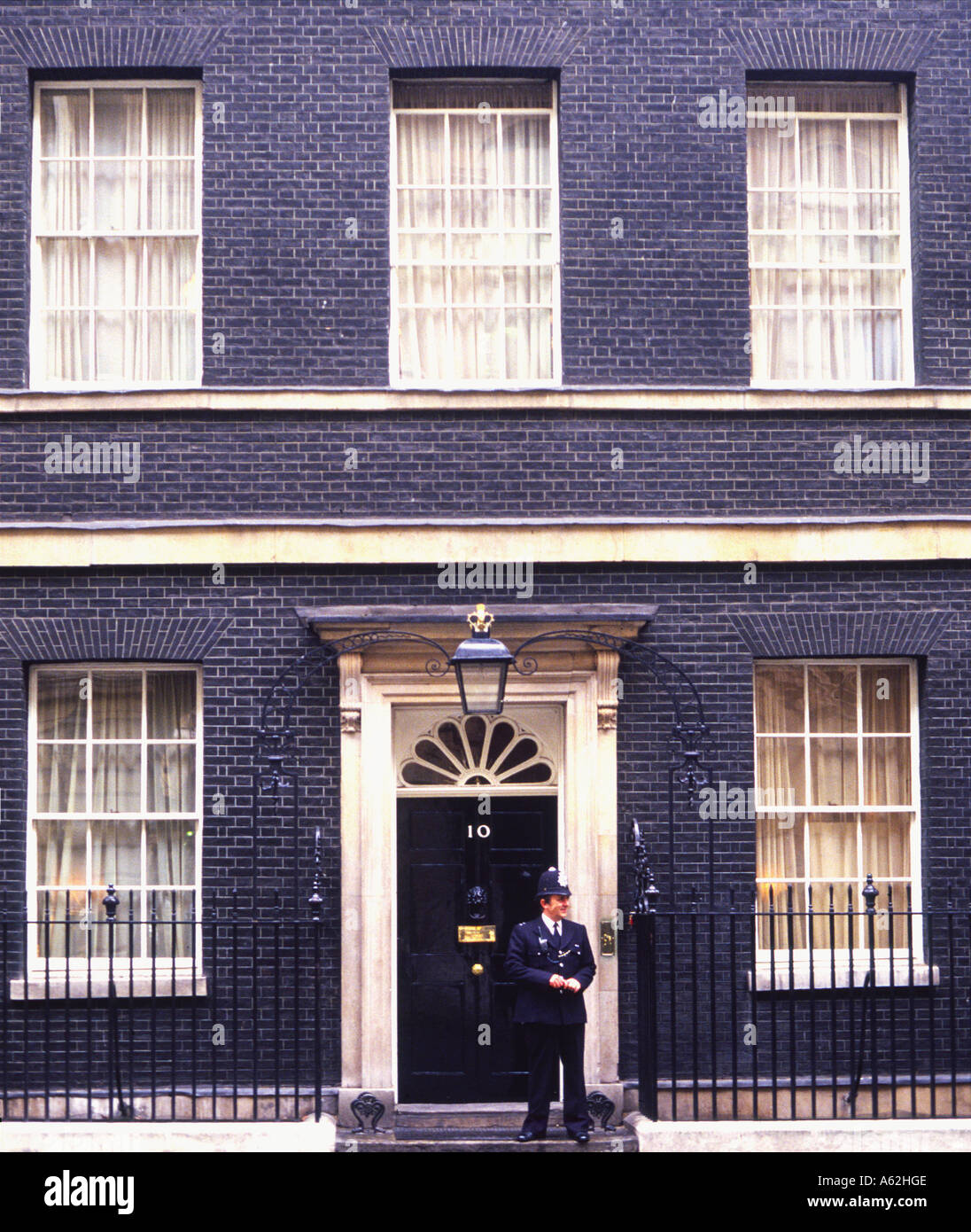 Policeman as security guard standing in front of prime minister's house ...