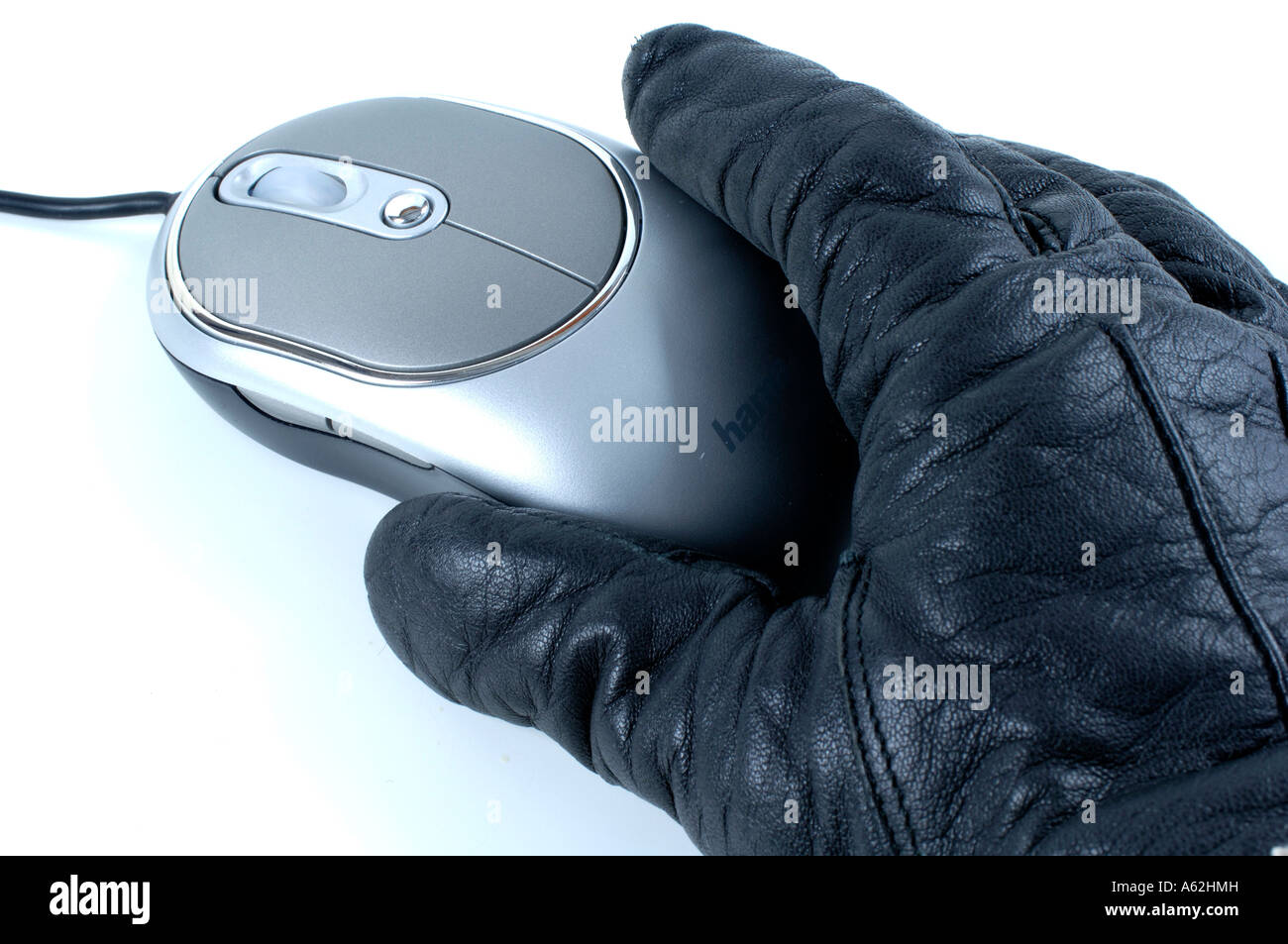 Hand in glove on computer mouse Stock Photo - Alamy