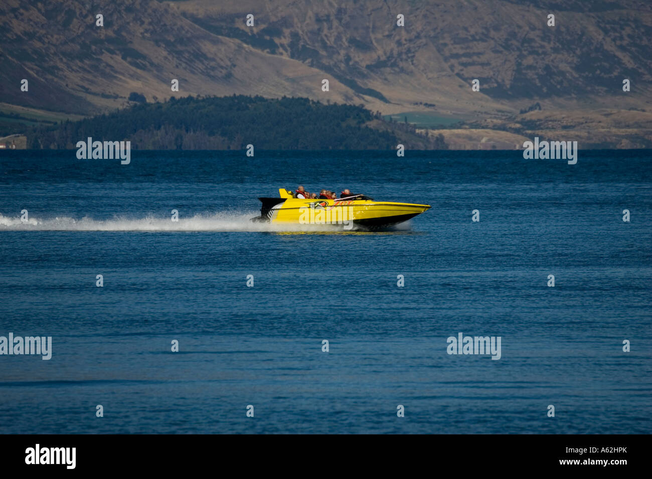 Tourists in Kawarau jet boat Queenstown South Island New Zealand Stock ...