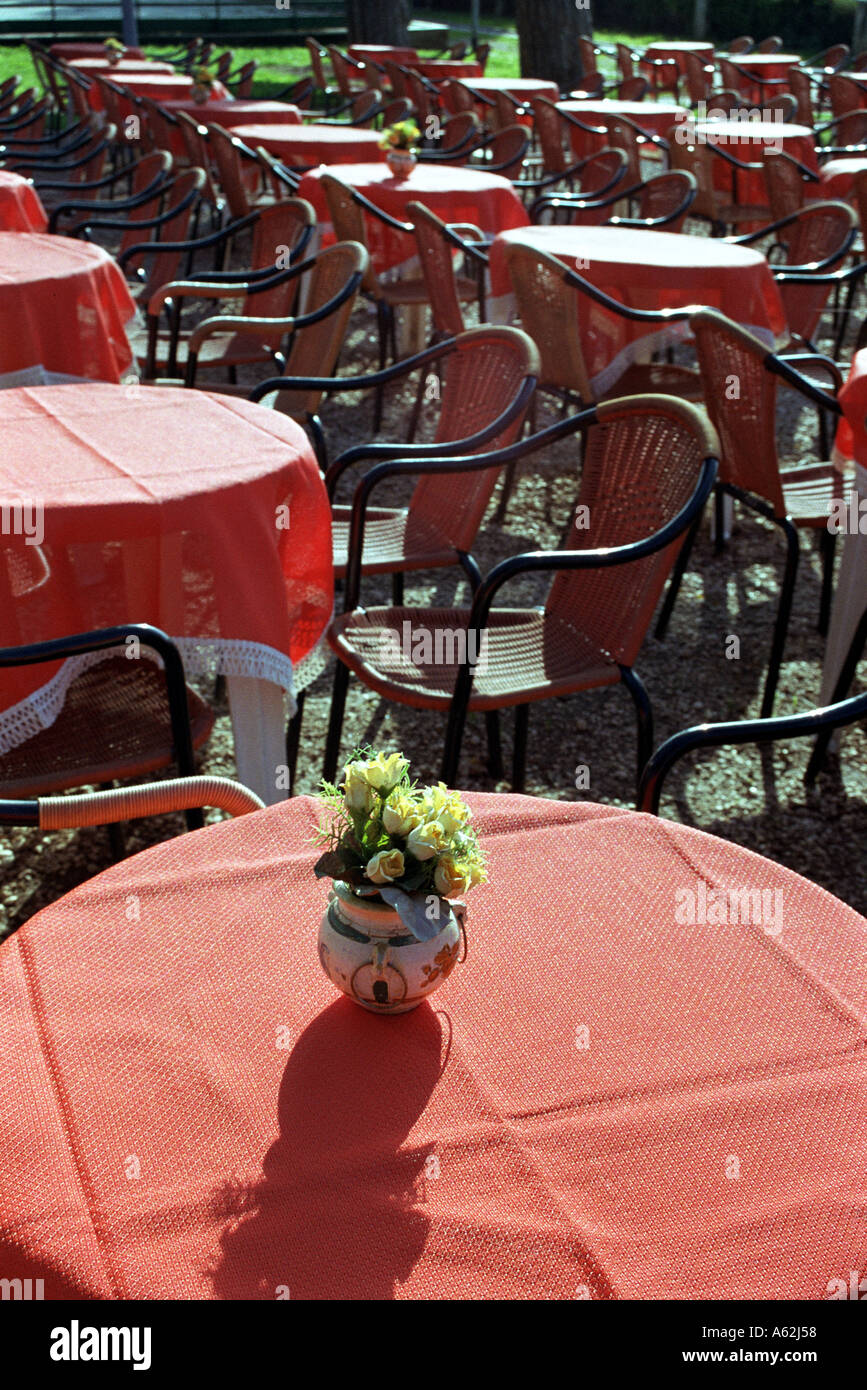 Empty tables bright yellow chairs hi-res stock photography and images ...